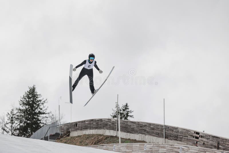 Male Ski Jumping Athlete Flying through the Air Stock Image - Image of ...