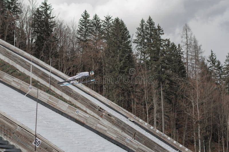 Male Ski Jumping Athlete Flying through the Air Stock Photo - Image of ...