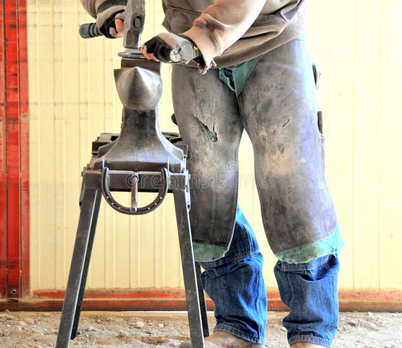 Male smithy working. stock image. Image of skill, manual - 89753847