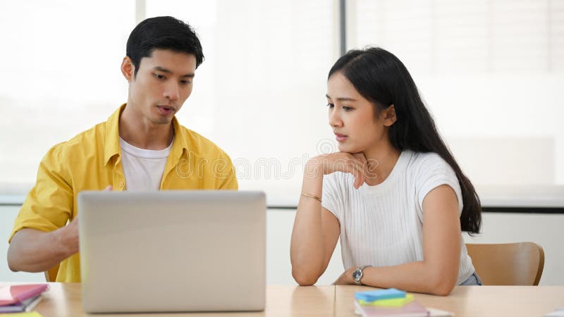 Male Software Engineer Fixing the Problems on Laptop Computer for ...