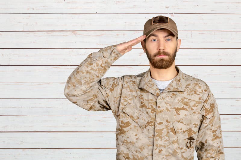 Male soldier saluting stock image. Image of forces, flag - 67835339