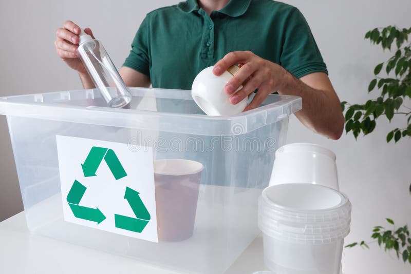 Male Sorting Plastic Trash and Putting Waste in Recycling Container ...