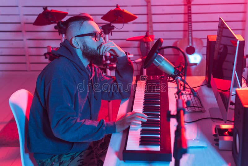 Male Sound Producer Working in Recording Studio. Stock Photo - Image of ...