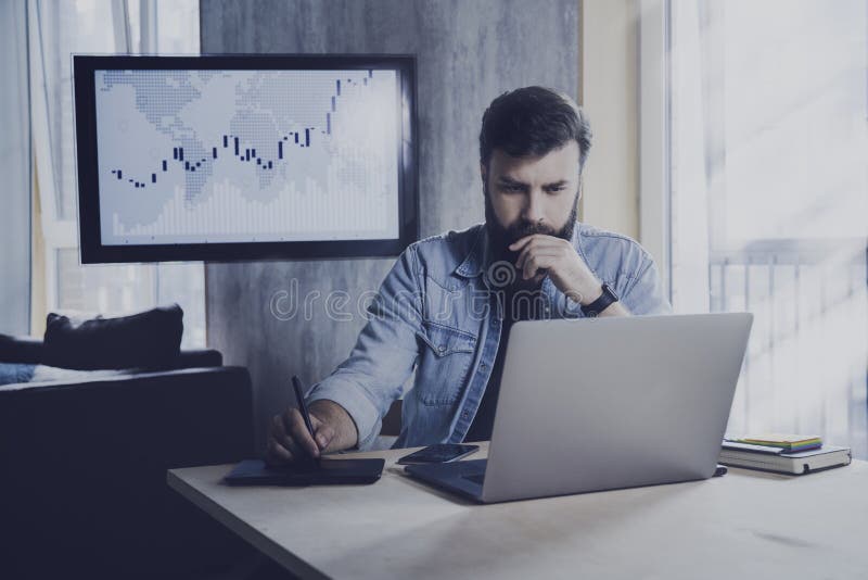 Male Specialist Sitting at Office Desk,working on Laptop. Young ...