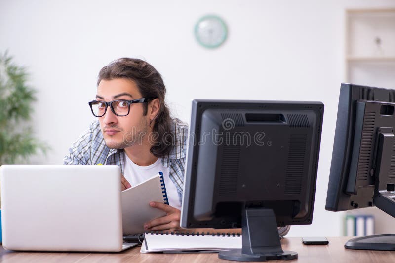 Young Male it Specialist Working in the Office Stock Photo - Image of ...