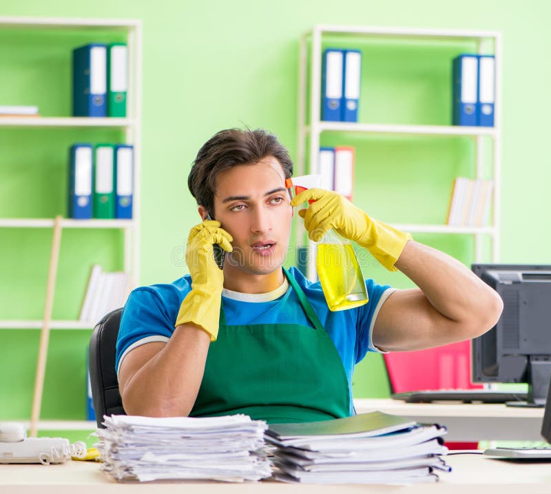 Male Spy Under Cleaner Cover Stealing Confidential Documents Stock ...