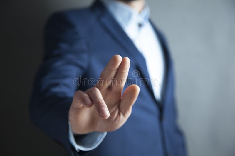 Male is Standing and Shows Outstretched Hand with Open Palm Stock Photo ...