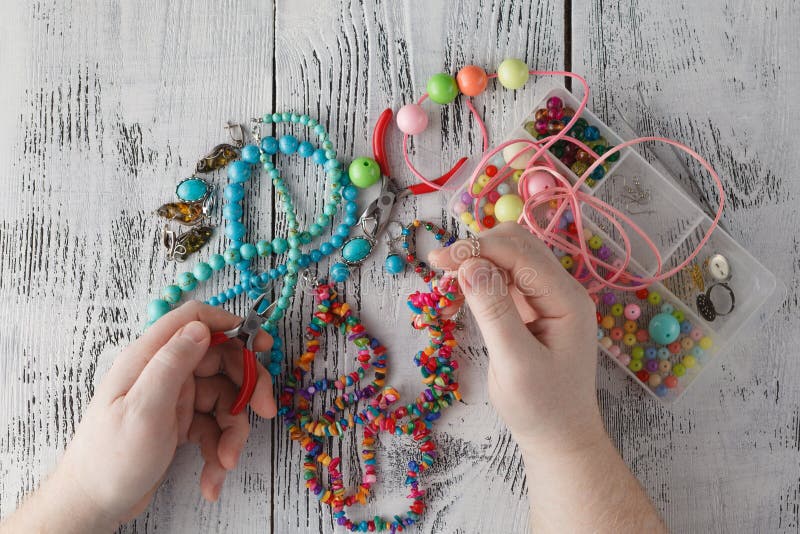 Male Stringing Beads on the Needle Stock Image - Image of chic, classic ...