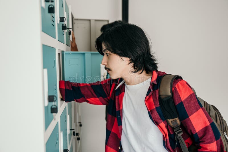 Male Student with Bag Open Locker and Store Stuff Stock Photo - Image ...