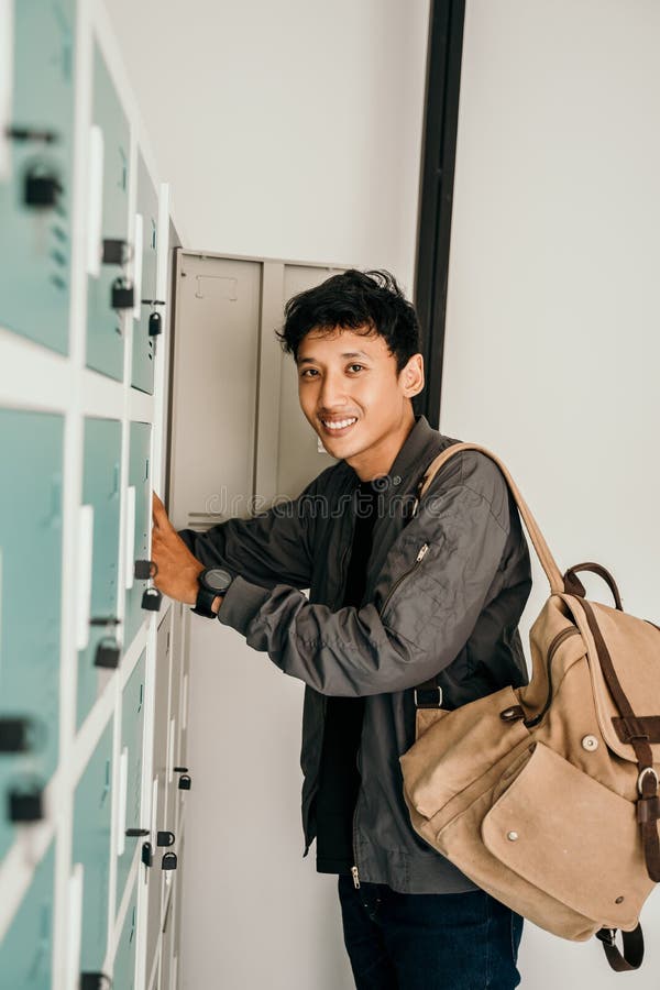 Male Student with Bag Open Locker and Store Stuff Stock Image - Image ...