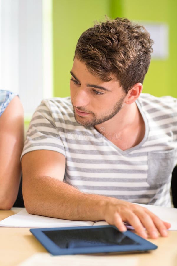 Male Student Doing Homework in Library Stock Image - Image of learn ...