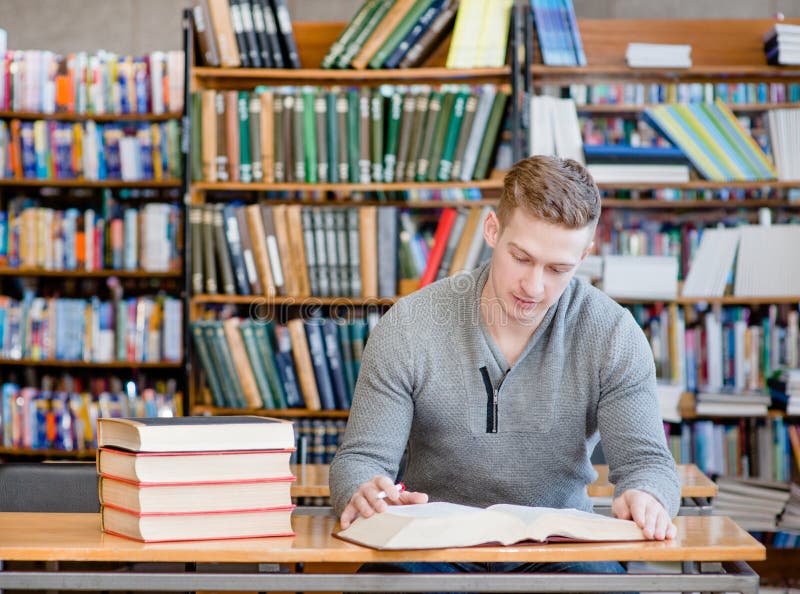 Student with Open Text Book Stock Image - Image of male, people: 10993483