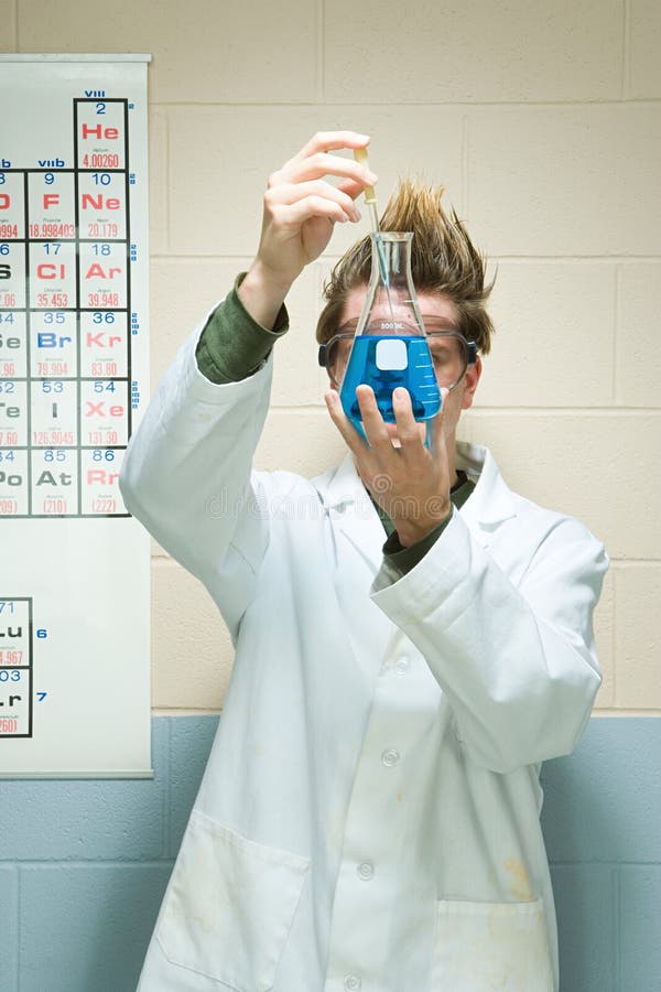 Male Student Performing an Experiment Stock Photo - Image of adult ...