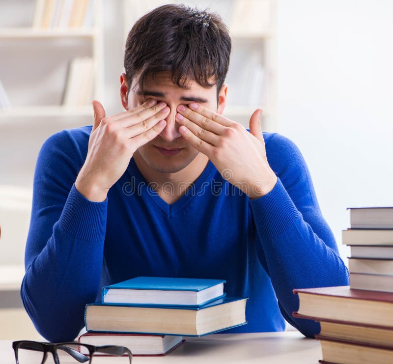 Male Student Preparing for Exams in College Library Stock Image - Image ...