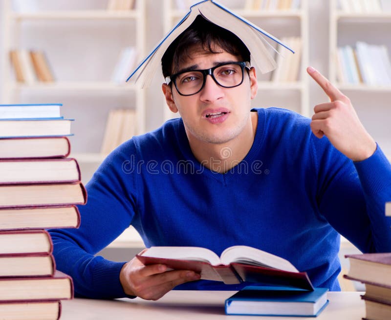 Male Student Preparing for Exams in College Library Stock Image - Image ...