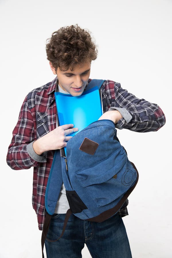 Male Student Pulls Out Backpack Something Stock Photos - Free & Royalty ...