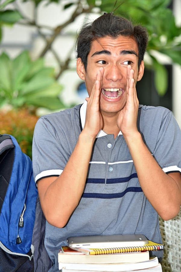 A Male Student Shouting stock image. Image of pupils - 137655743
