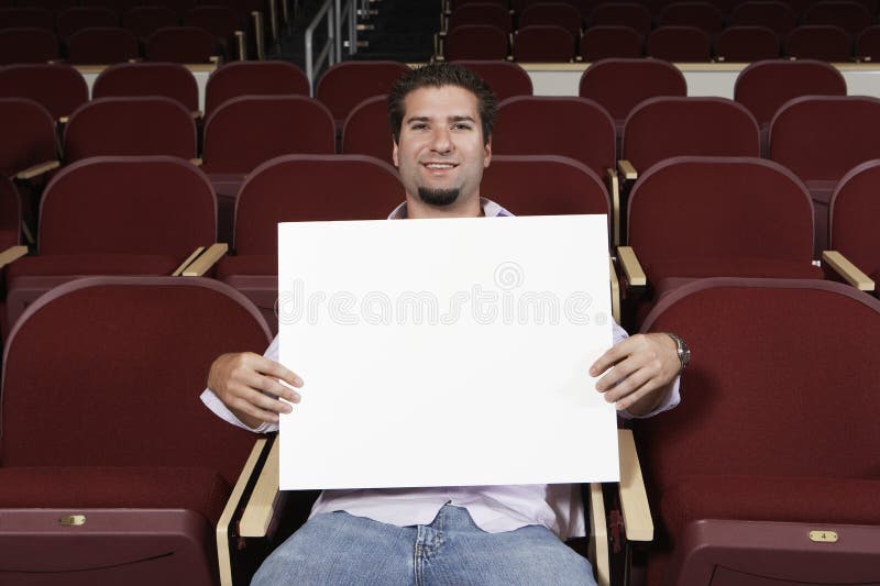 Male Student with Sign Board in Classroom Stock Image - Image of ...