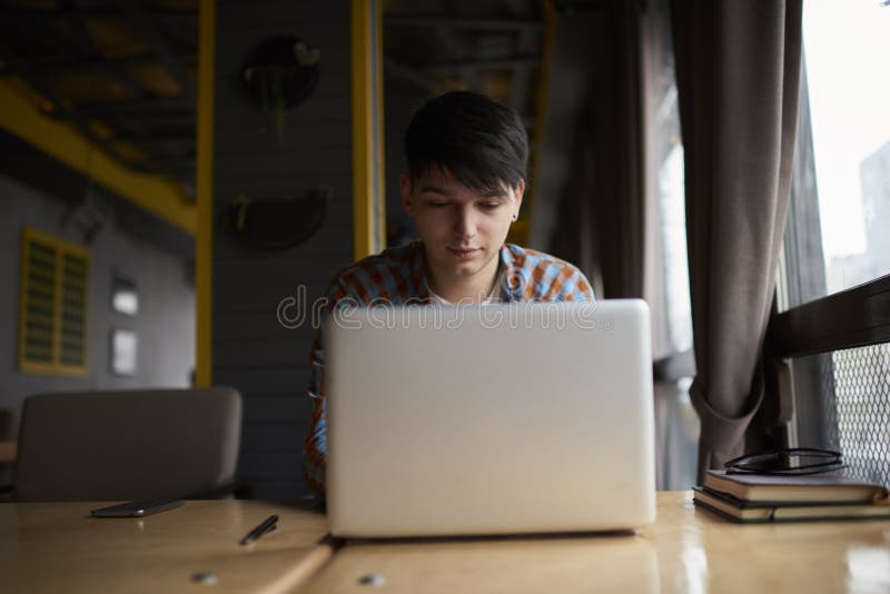 Male Student Sitting Front Open Laptop Computer. Stock Photo - Image of ...