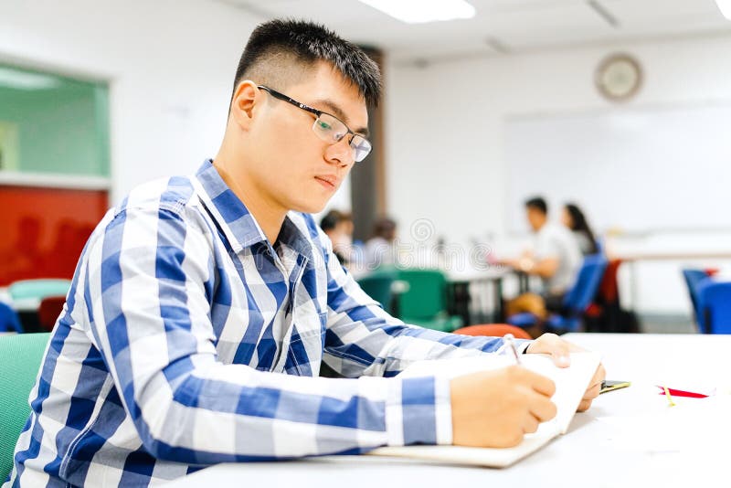 Male Student Study Campus Concentrate Doing Homework Stock Photos ...