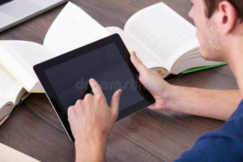Young Student Using a Tablet Computer Stock Image - Image of screen ...