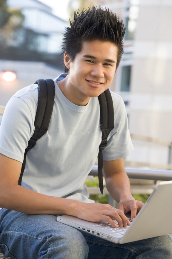 Male Student Using Laptop Outside Stock Photo - Image of person ...