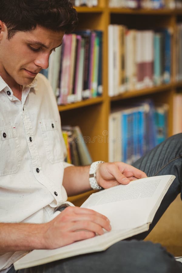 Male Student Working on Floor Stock Photo - Image of revising ...