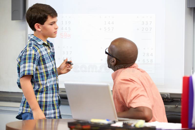 Male Student Writing Answer on Whiteboard Stock Image - Image of ...