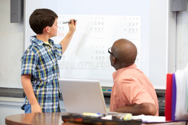 Male Student Writing Answer on Whiteboard Stock Image - Image of ...