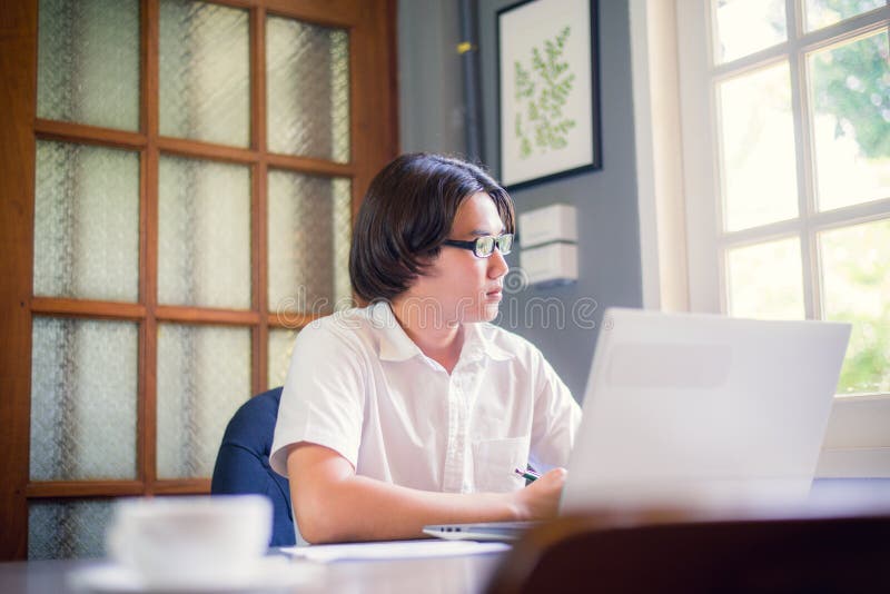 Male Students are Using the Idea To Review the Lesson.Preparing Stock ...