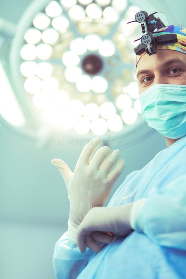 Male Surgeon on Background in Operation Room Stock Photo - Image of ...