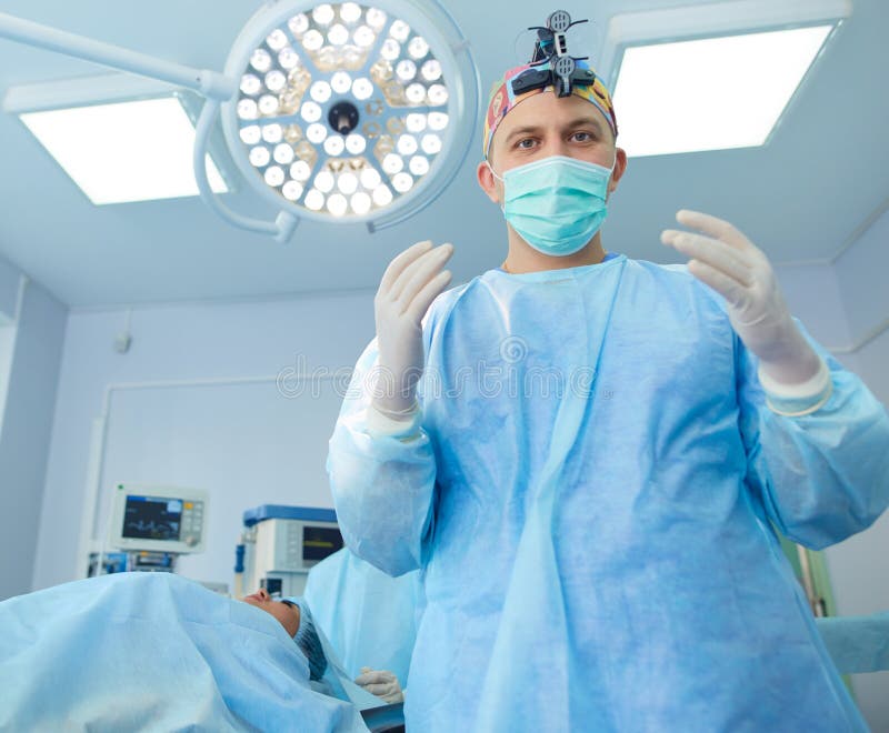 Male Surgeon on Background in Operation Room Stock Photo - Image of ...