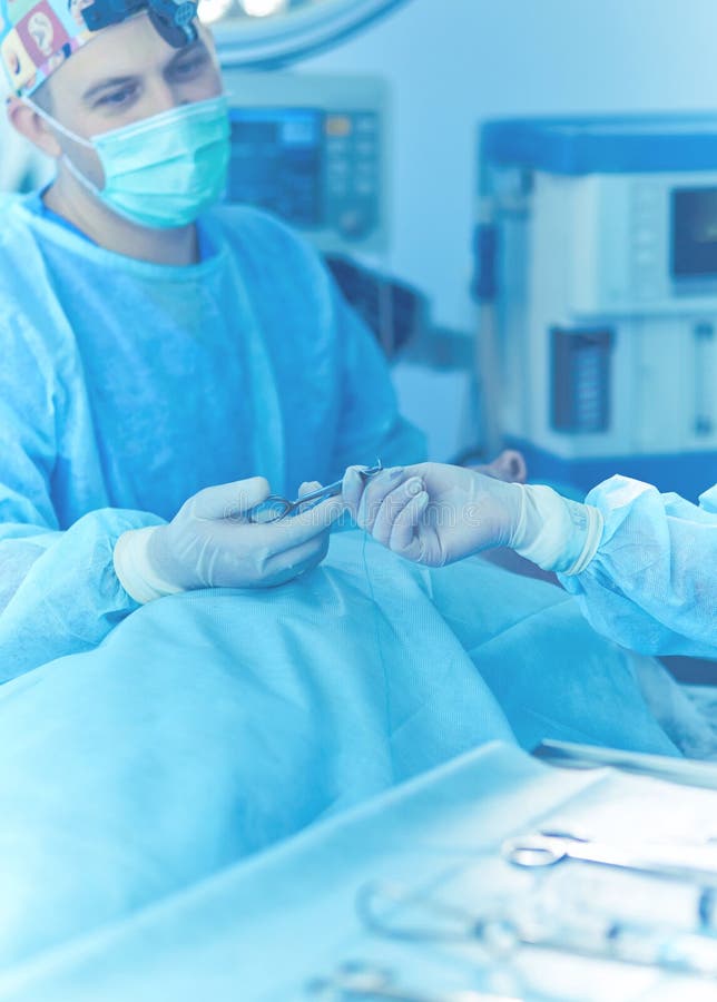 Male Surgeon on Background in Operation Room Stock Photo - Image of ...