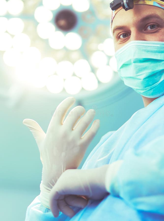 Male Surgeon on Background in Operation Room Stock Photo - Image of ...