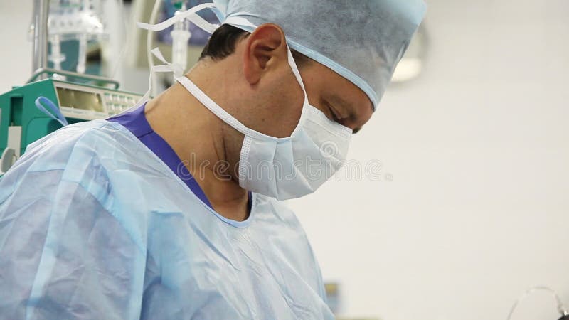 Male Surgeon Preforming Operation Uterus Removal in Hospital Operating ...