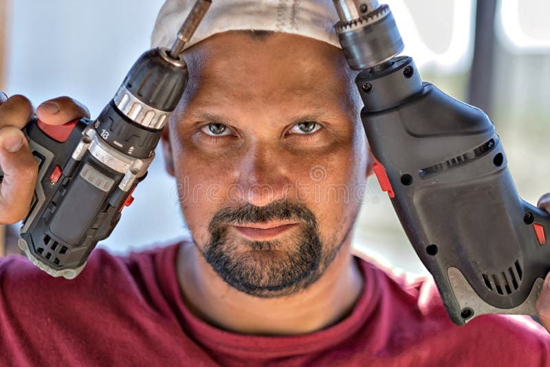 Male Swarthy Builder at Work. Close-up Portrait of a Worker with a ...