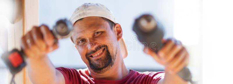 Male Swarthy Builder at Work. Close-up Portrait of a Worker with a ...