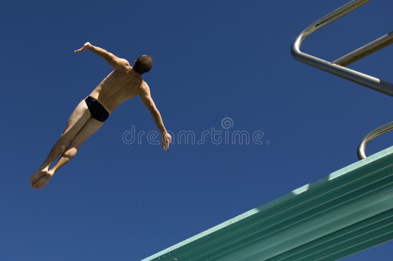 Male Swimmer Diving from Springboard Stock Photo - Image of outdoors ...