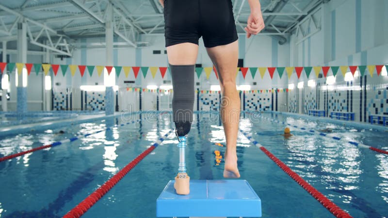 Male Swimmer with Leg Prosthesis, Back View. Stock Footage - Video of ...