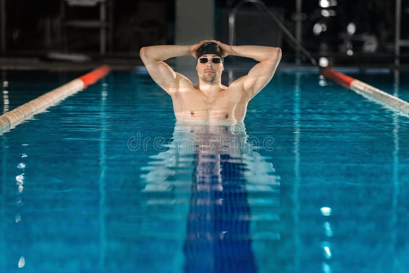 Male Swimmer Resting in Pool Stock Photo - Image of active, fresh ...