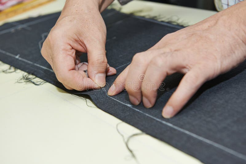 Tailor hands at works stock image. Image of garment, costume - 35810463
