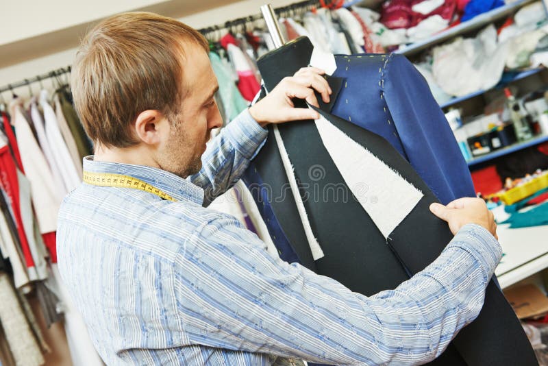 Tailor suit fitting stock image. Image of manufacture - 45617787
