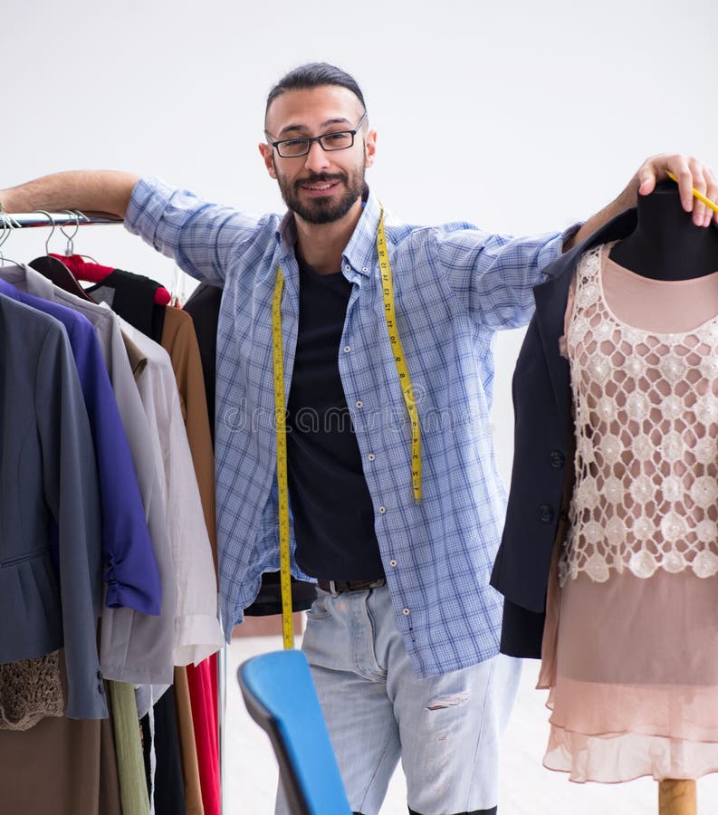 Male Tailor Working in the Workshop on New Designs Stock Image - Image ...