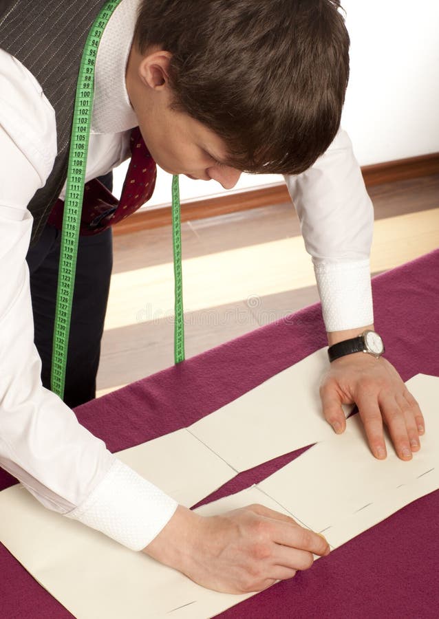 Male tailor in workshop stock image. Image of occupation - 64744829