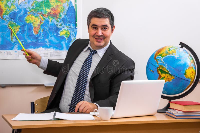A Male Teacher Leads a Lesson in Geography Stock Image - Image of globe ...
