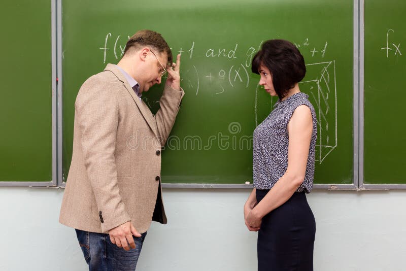 The Teacher Scolds Student and Throws Him Stock Photo - Image of ...