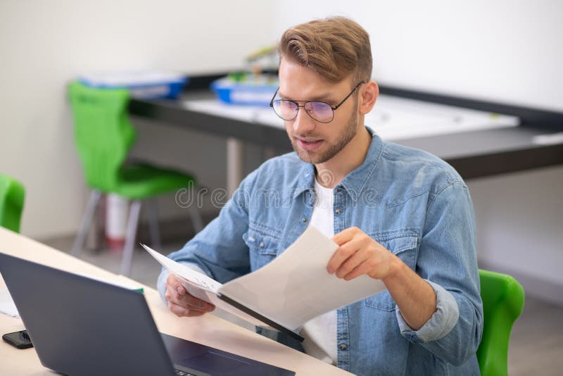 Checking Her Notes at the Trainstation Stock Photo - Image of woman ...