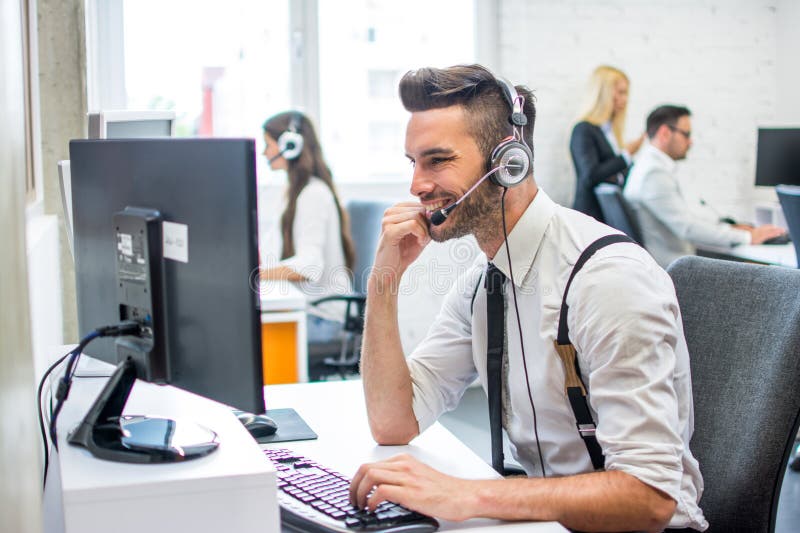 Male Technical Support Agent with Headset Talking with Customer in Call ...