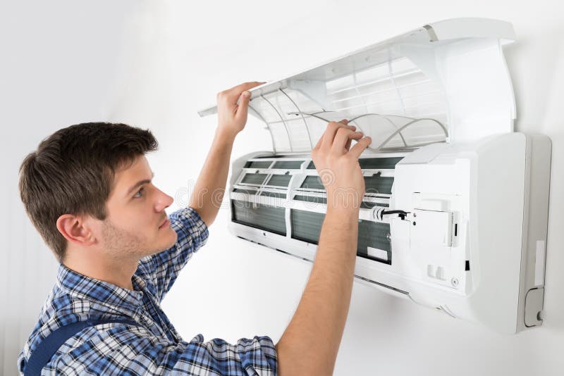 Installing Air Conditioning Unit Stock Image - Image of contractor ...