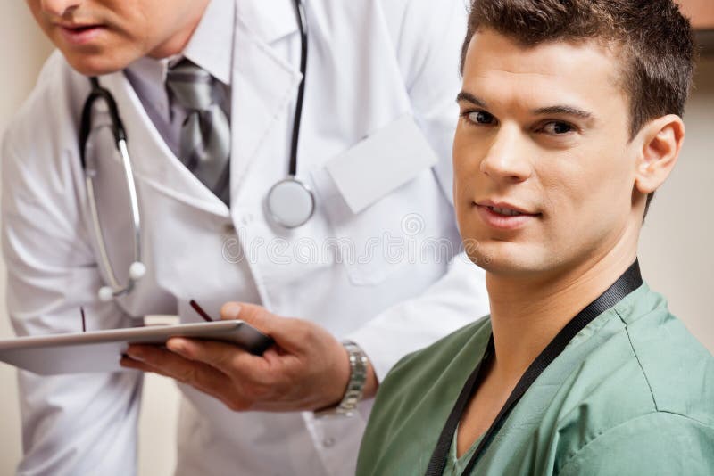 Doctor And Technician Working Together Stock Photo - Image of clipboard ...